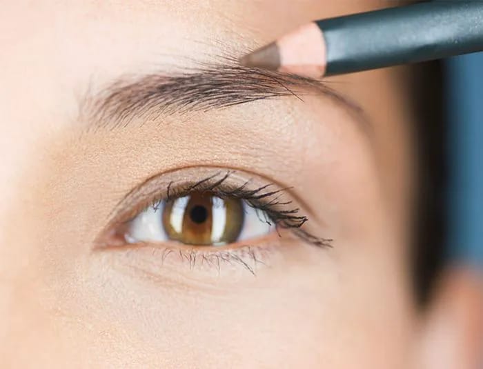 How To Deal With Losing Eyebrow Hair As You Age, According To Experts ...
