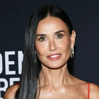 Demi Moore Flaunts Her Age-Defying Beauty In A Chic Halter Dress For ...