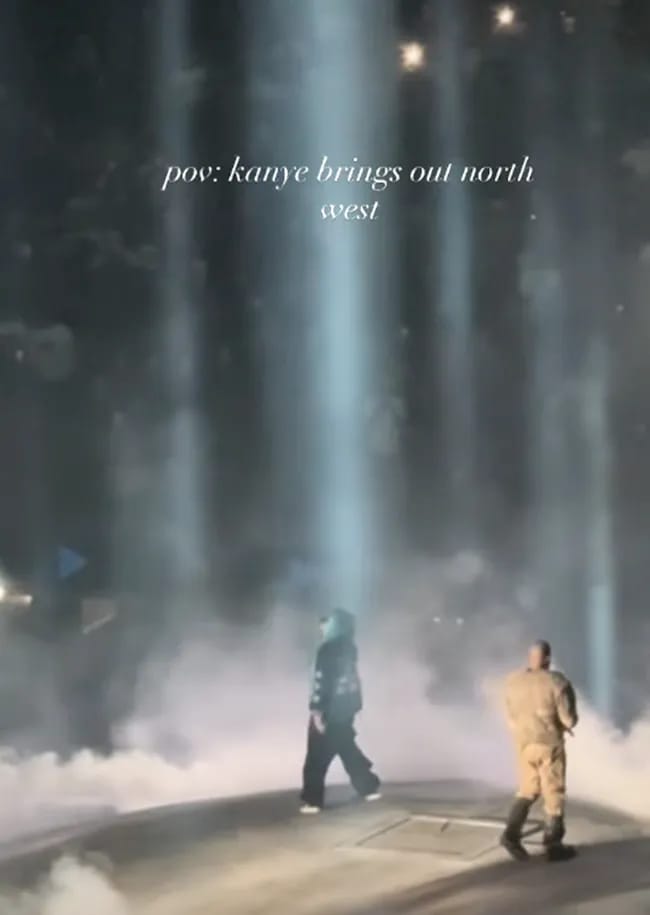 North West Joins Kanye West On Stage At His LA Concert And Raps Abo...