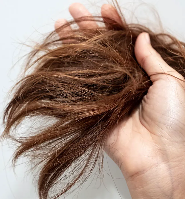 The One Shower Mistake You Could Be Making That’s Causing Your Hair To ...