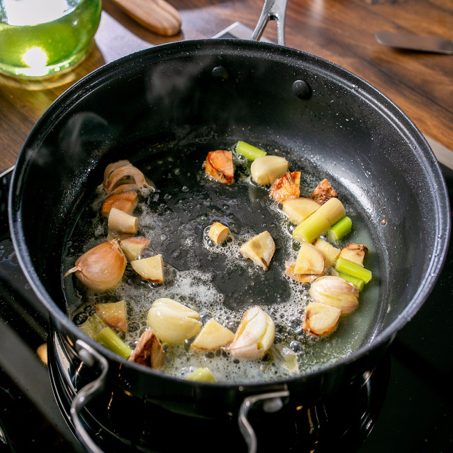 Why Sprinkling Garlic On Your Vegetables May Cause Bloating, According ...