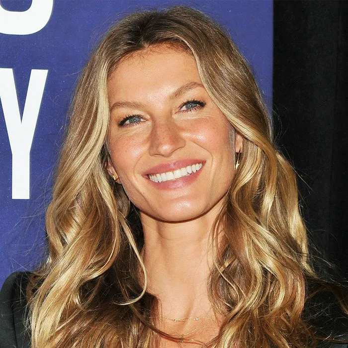 Gisele Bündchen Rides Her Bike in Micro Shorts And A Low-Cut Tank Top ...
