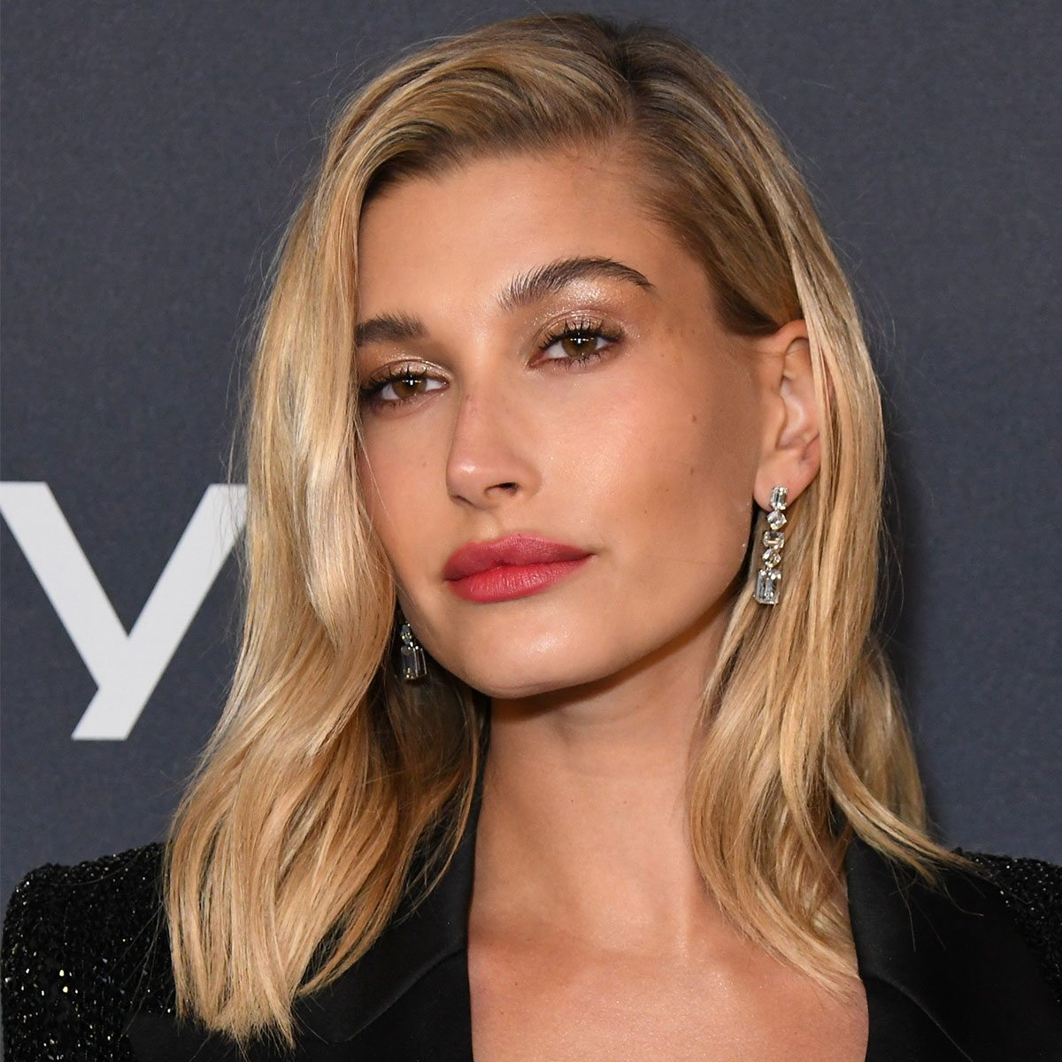 Hailey Bieber Slayed A Cream Mini Dress With A Chest Cutout And Two ...