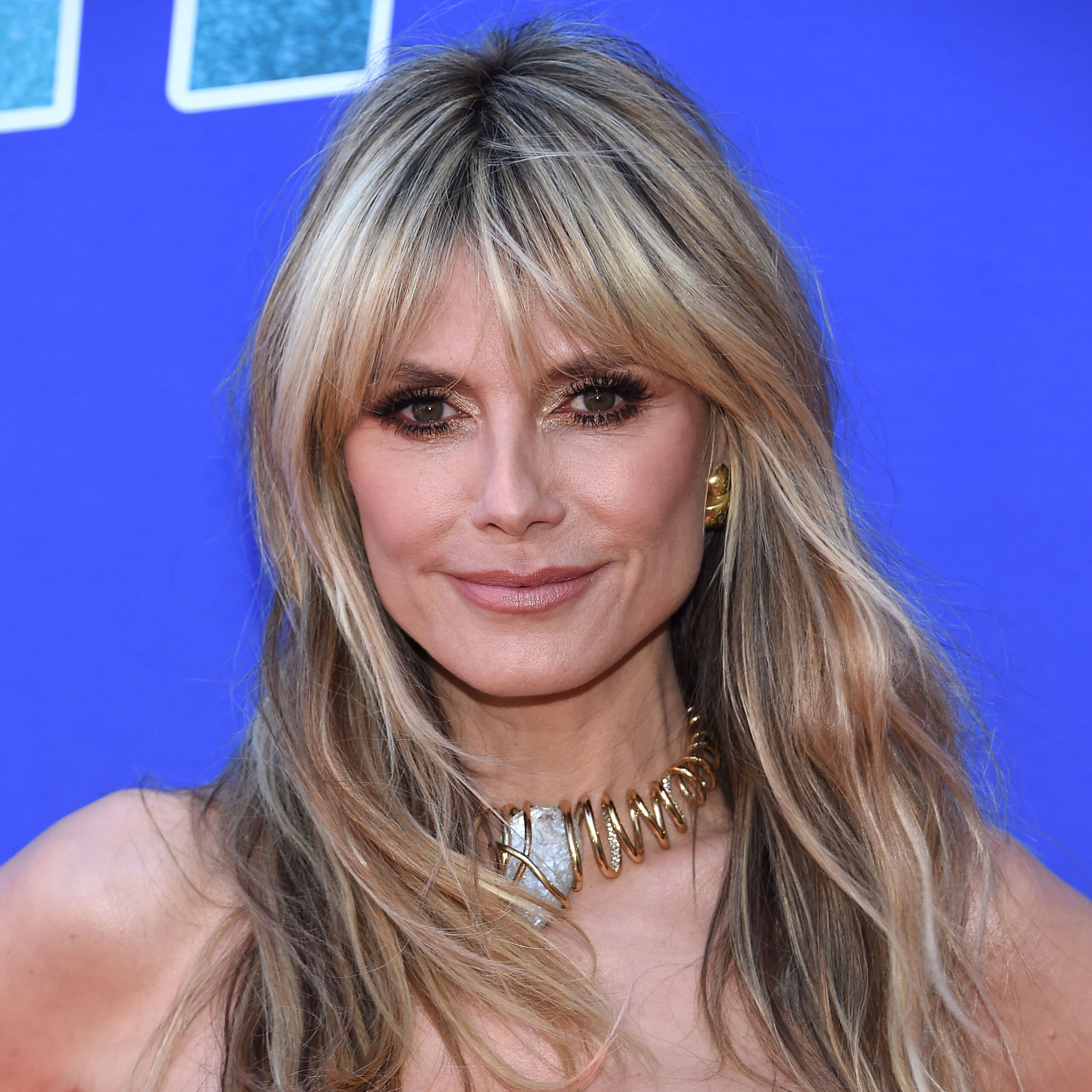 Heidi Klum Rocks Ripped Jeans And Plunging White Tank Top In New ...