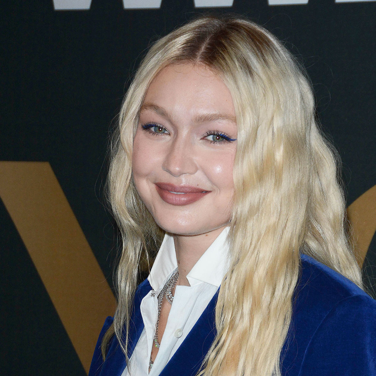 Margot Robbie Flashes Her Abs In A Black Peek-A-Boo Crop Top At The ...