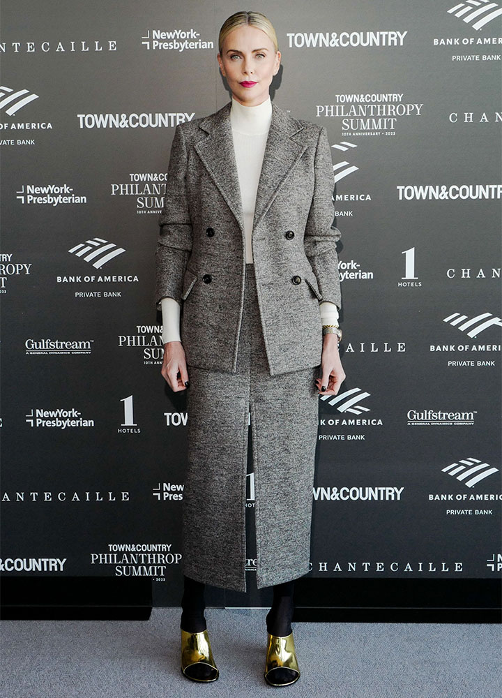 Charlize Theron Stole The Show In A Chic Power Suit & Gold Heels At ...