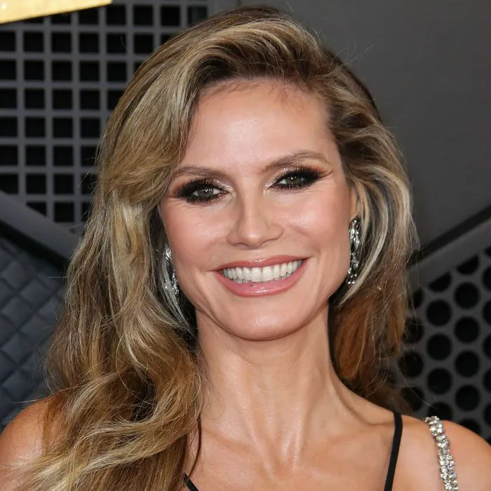 Heidi Klum Shows Some Serious Skin At The Grammys In A Black ...