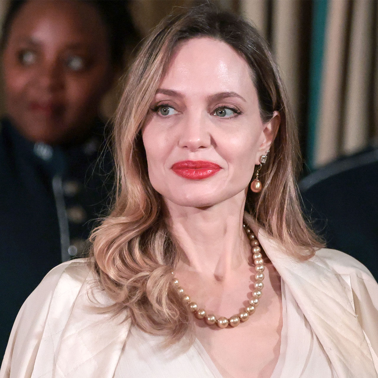 Angelina Jolie Looks Effortlessly Chic In A Lace Top & Tinted Shades As ...