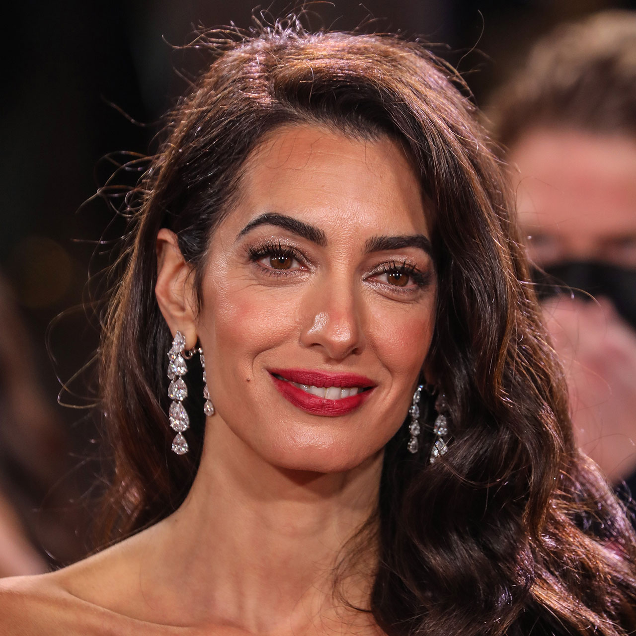 Amal Clooney Steps Out In A Floral-Print Summer Dress While Holding ...